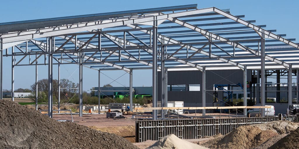 Bois ou acier : quelle structure choisir pour son bâtiment industriel ...
